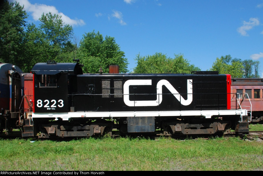 CN 8223 stands idle in the Cooperstown & Charlotte Valley RR yard